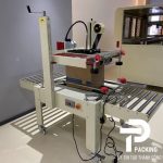 MÁY DÁN THÙNG CARTON FXJ-6050(TP-MDT 01) dán thùng trên dưới